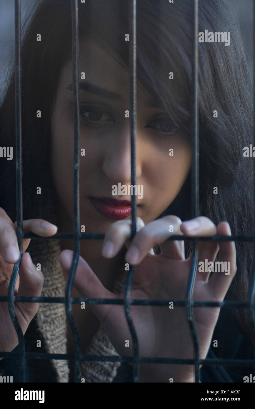 Women behind bars hi-res stock photography and images - Alamy