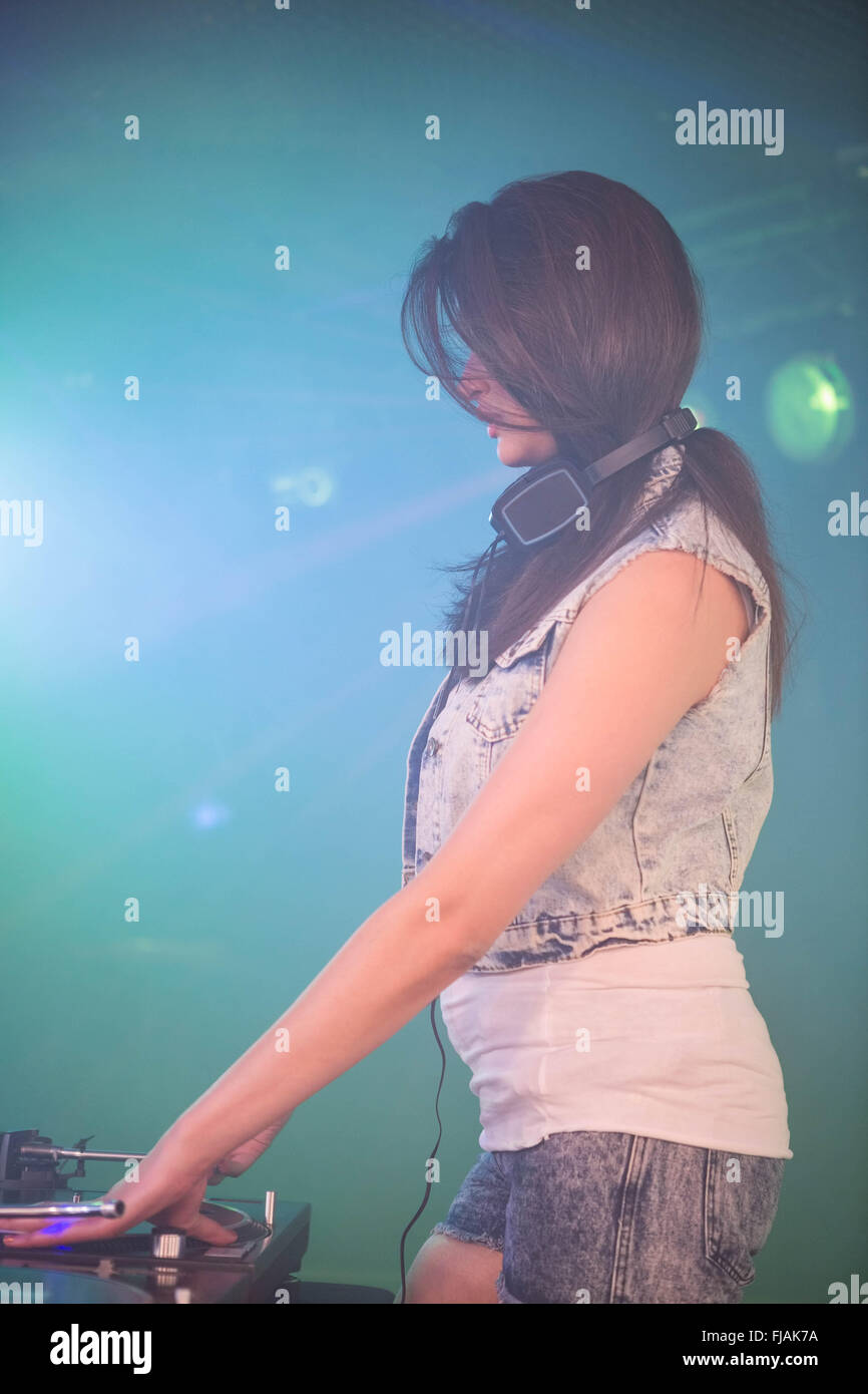 Female dj mixing sound hi-res stock photography and images - Alamy