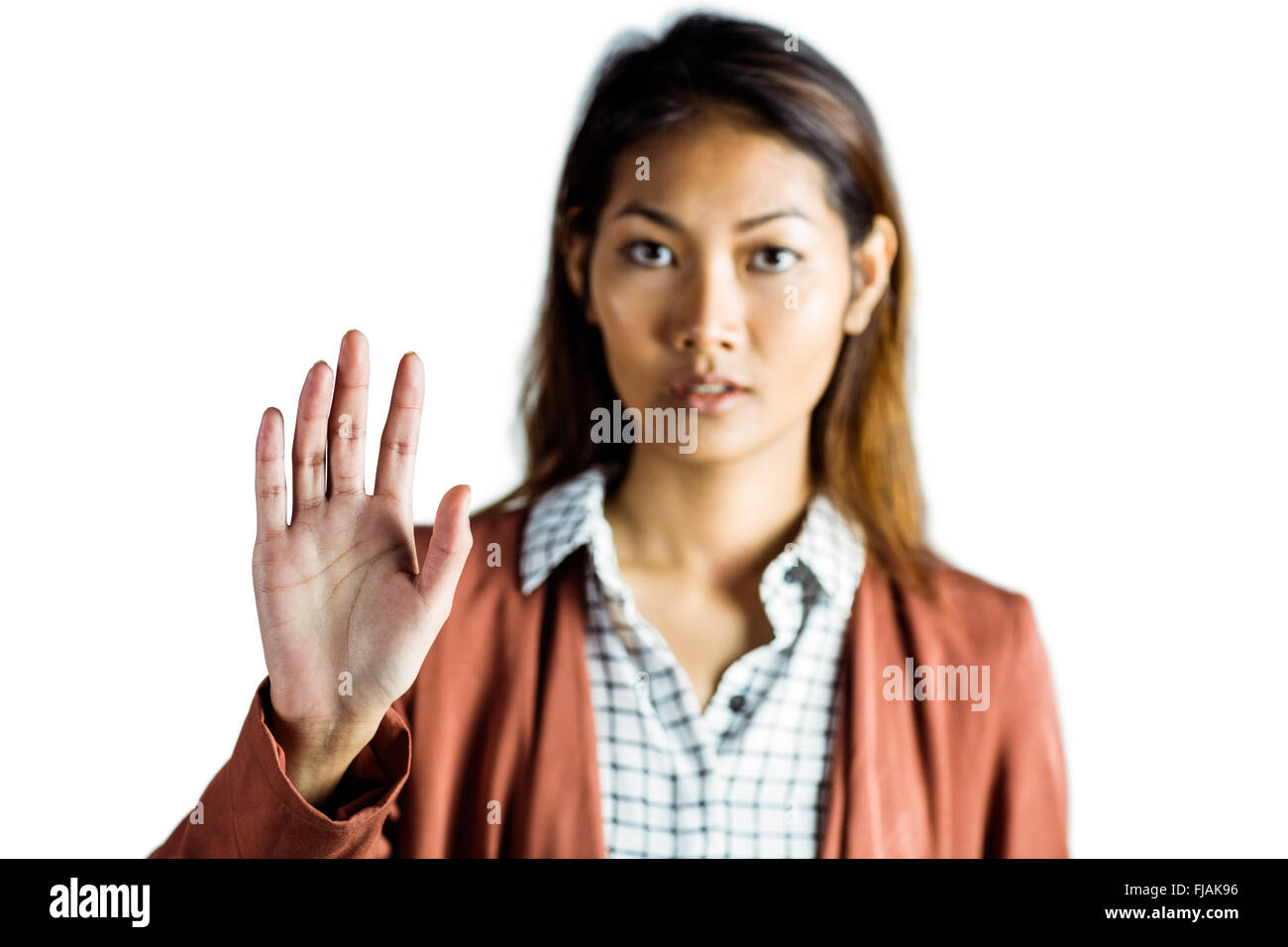 Serious businesswoman showing her hand Stock Photo - Alamy