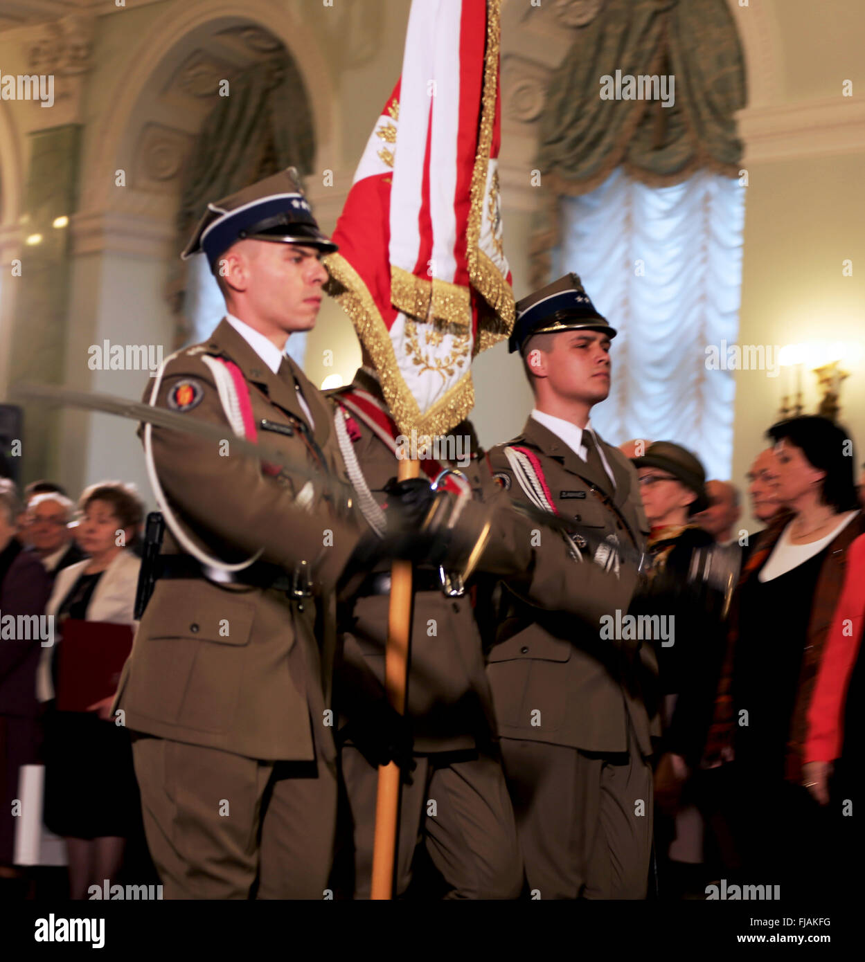 Polish soldiers carry out the Polish army flag during celebrations in ...