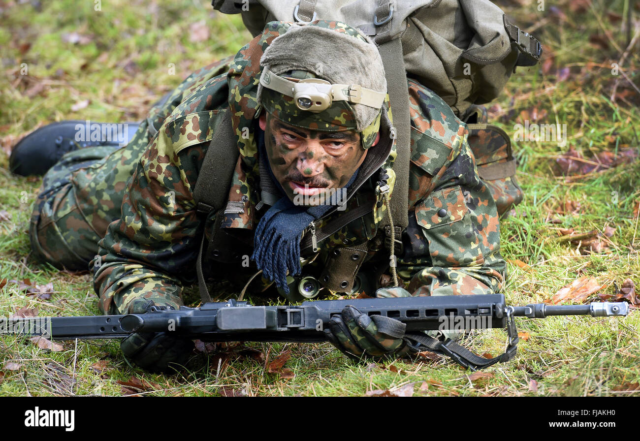 Munster, Germany. 01st Mar, 2016. A Kurdish officer is trained by ...