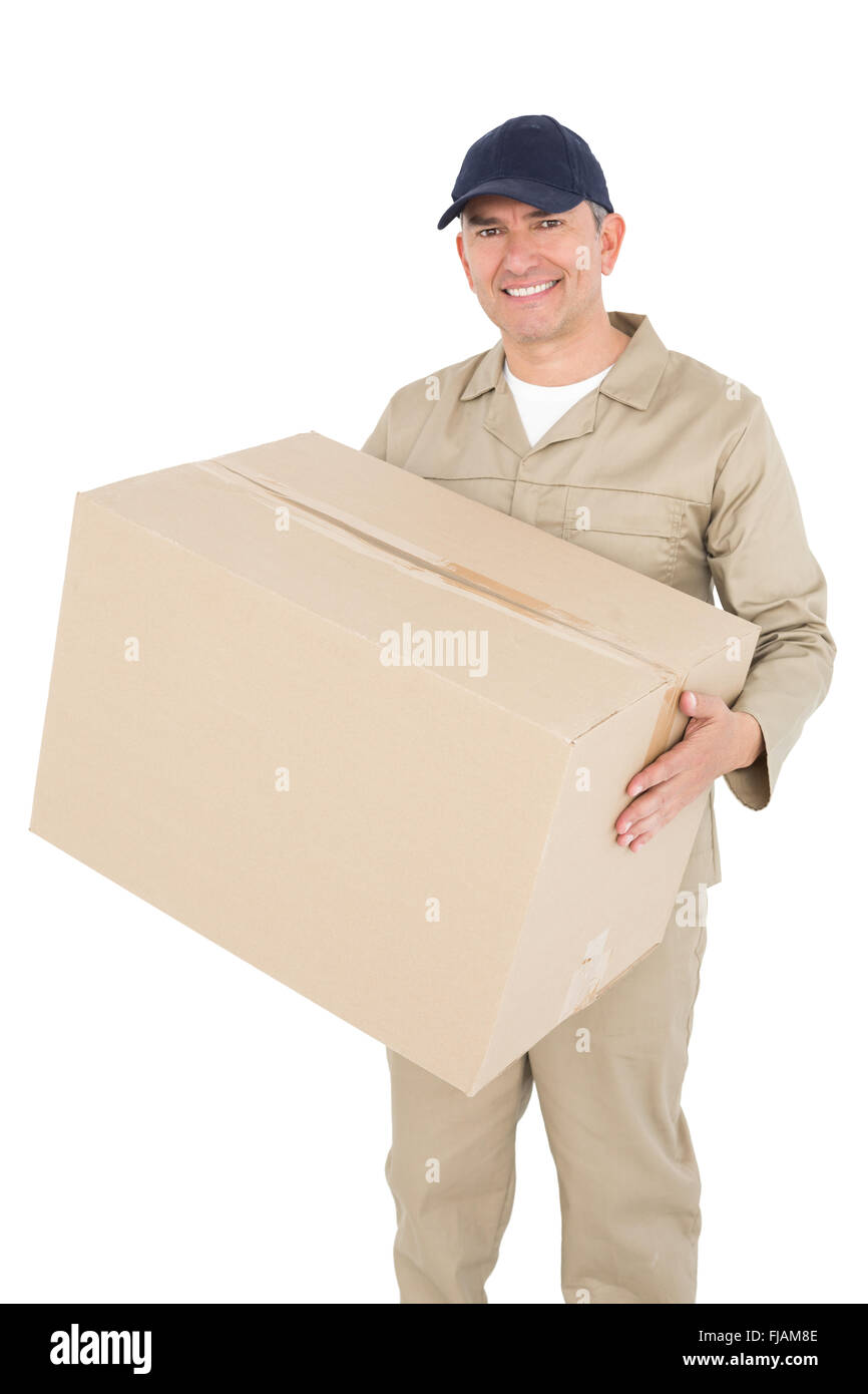 Delivery man carrying a package Stock Photo - Alamy