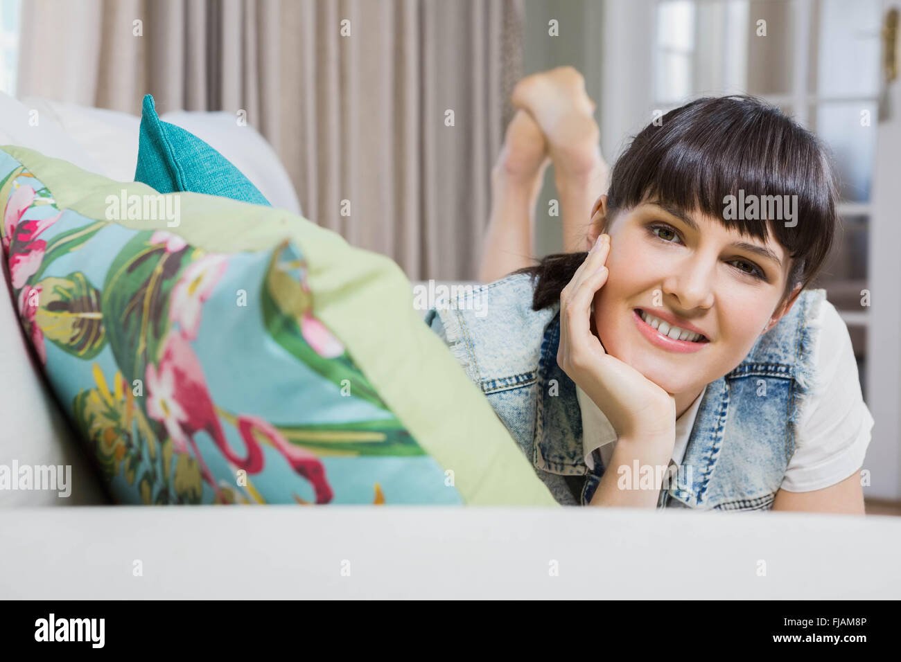 Portrait of beautiful young woman relaxing Stock Photo - Alamy