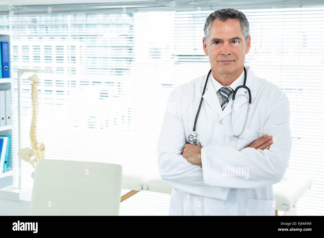 Portrait of confident doctor Stock Photo - Alamy