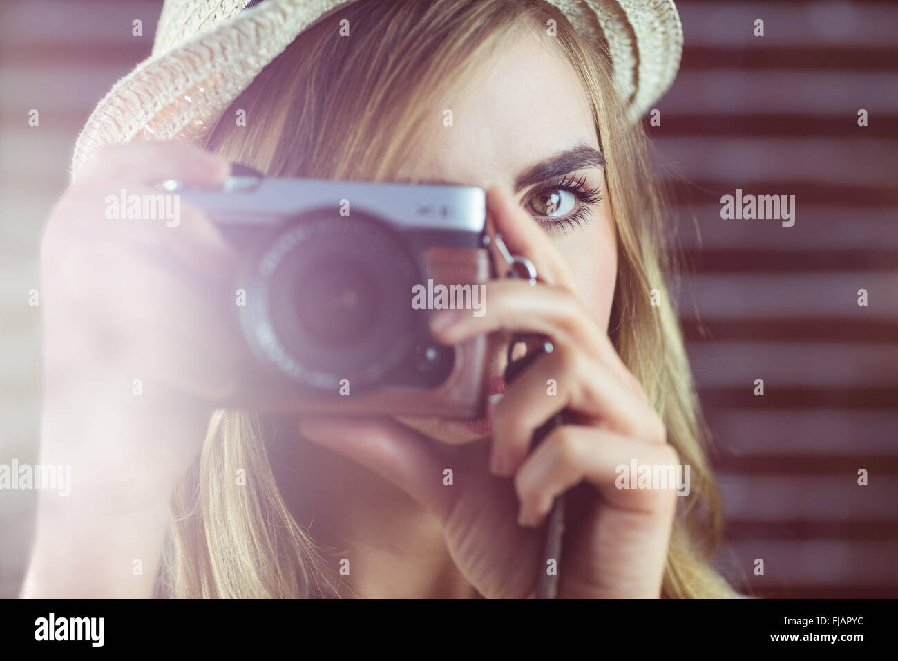 Woman taking pictures Stock Photo - Alamy