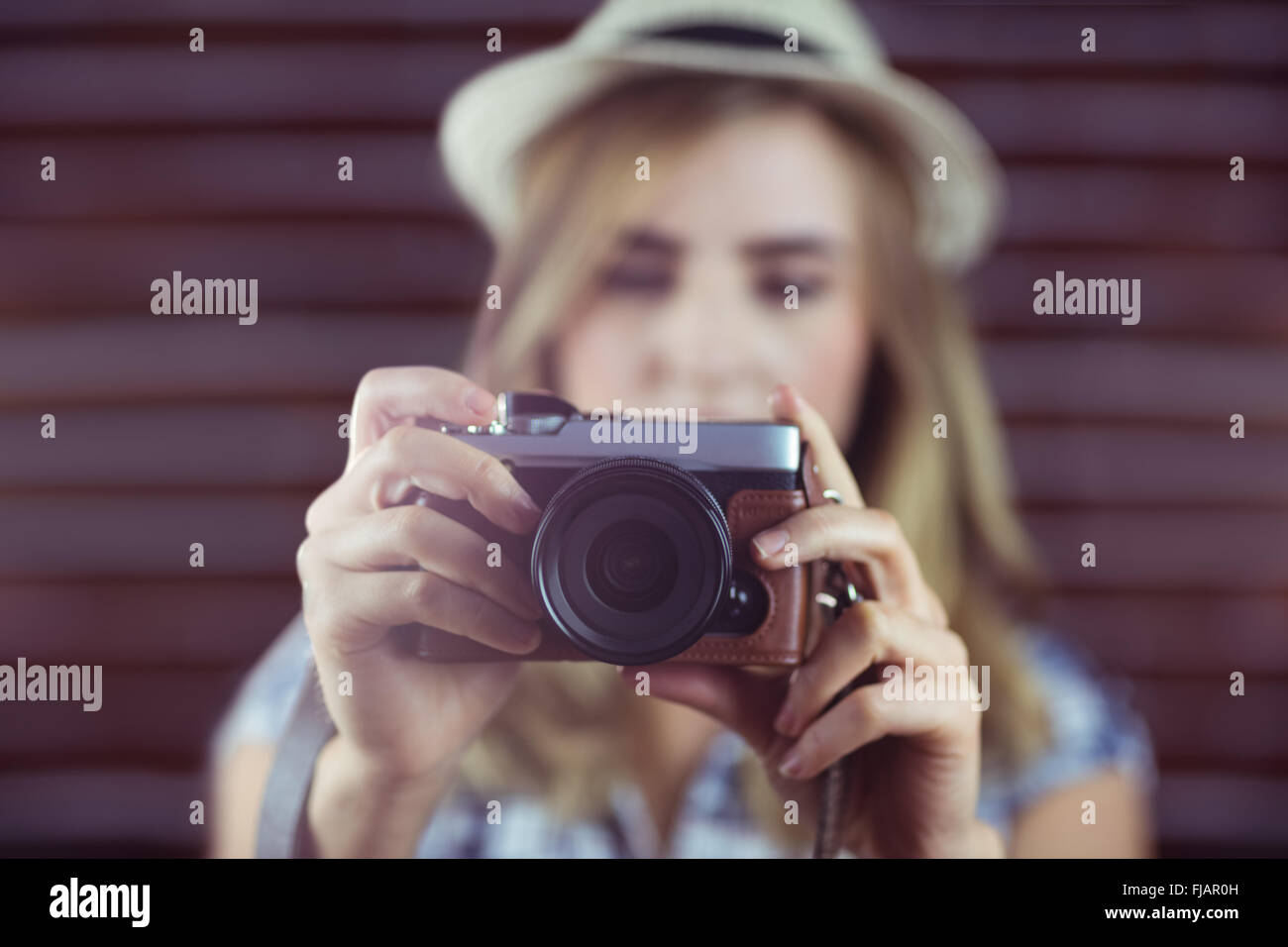 Woman taking pictures Stock Photo - Alamy