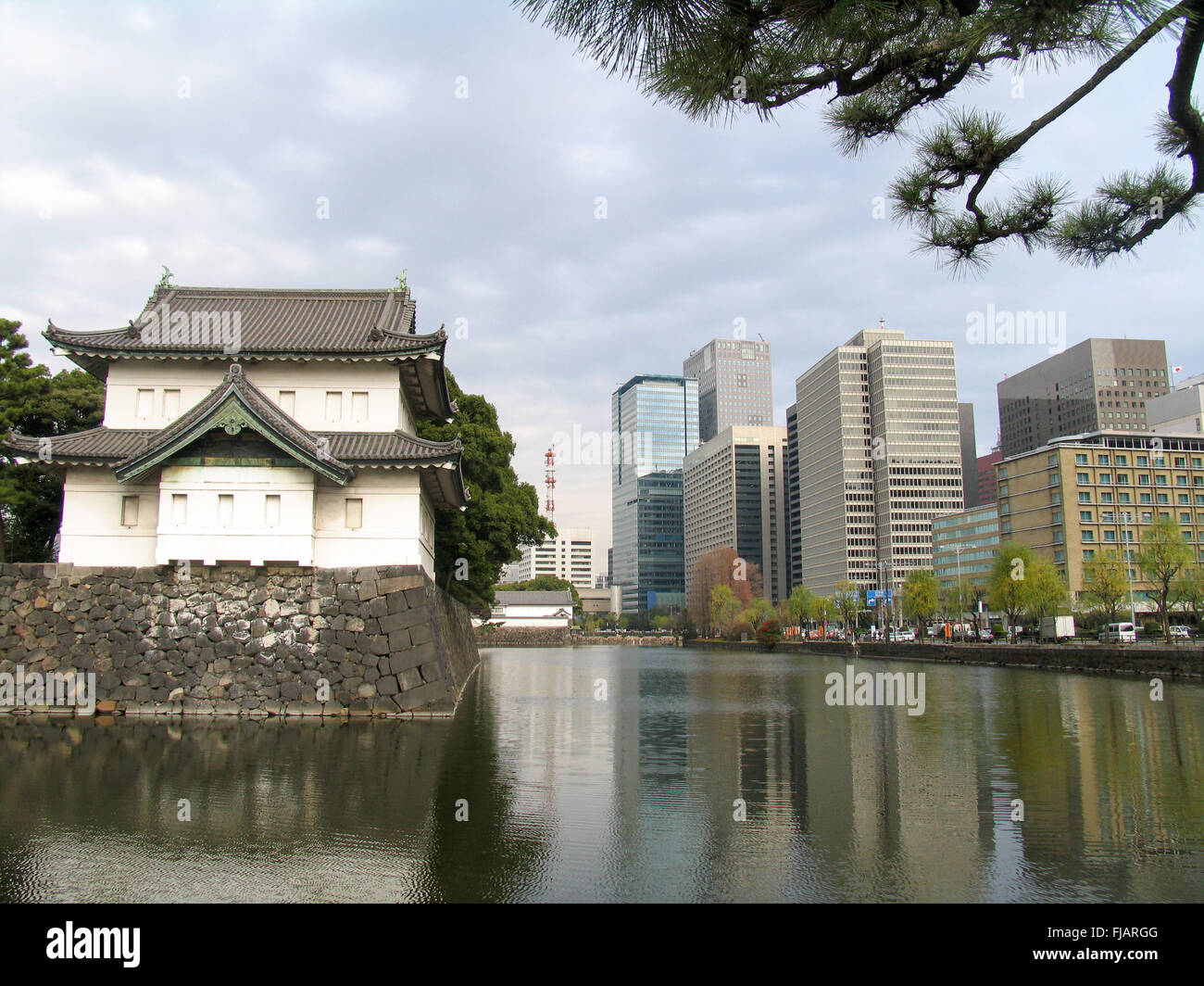 Guard tower of the Imperial Palace, and Tokyo skyline Stock Photo - Alamy