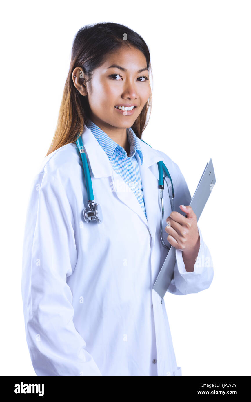 Asian doctor holding clipboard Stock Photo - Alamy