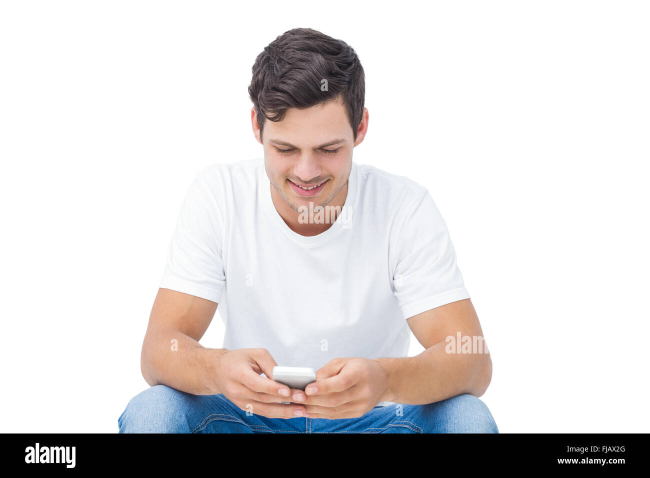Handsome man texting Stock Photo - Alamy