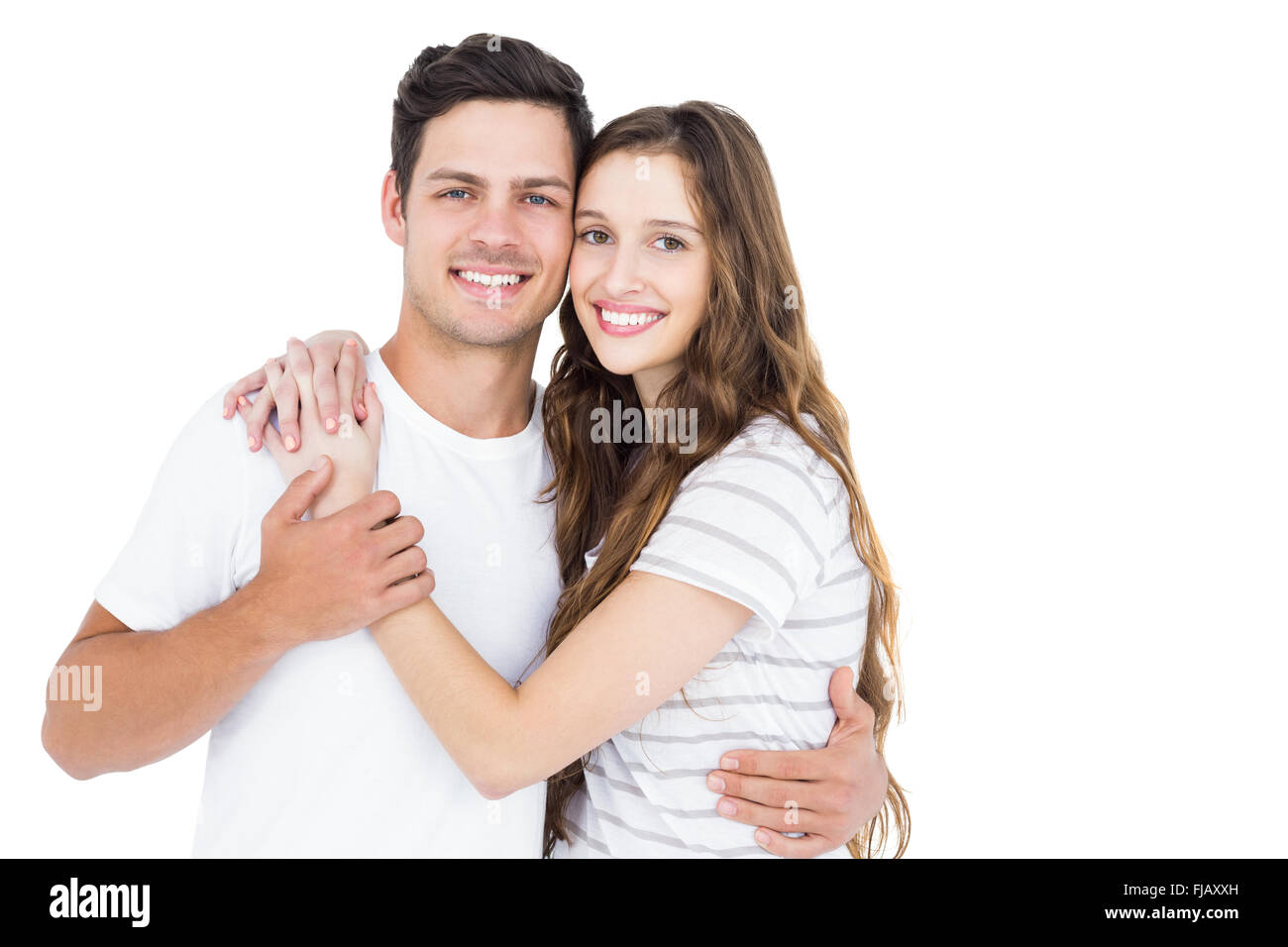 Cute couple embracing and looking the camera Stock Photo - Alamy