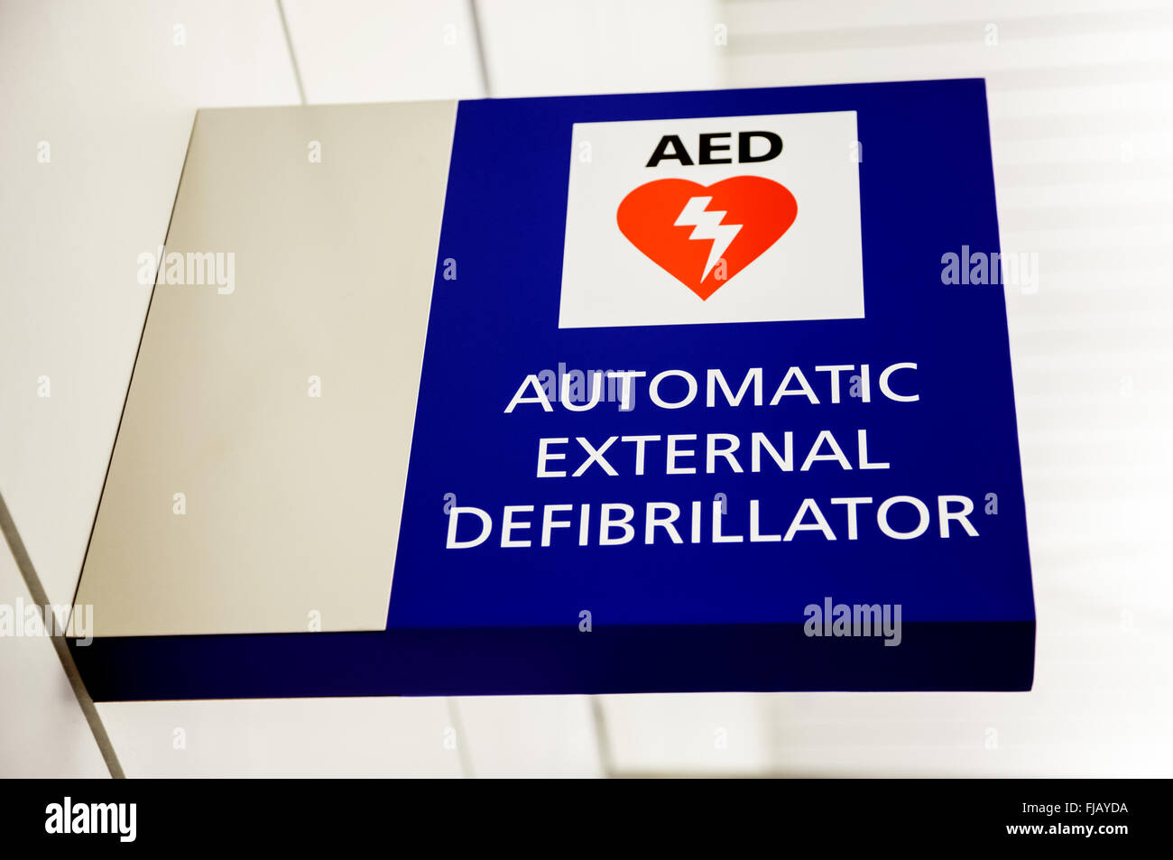 AED Automatic External Defibrillator Sign on a wall at an airport Stock ...