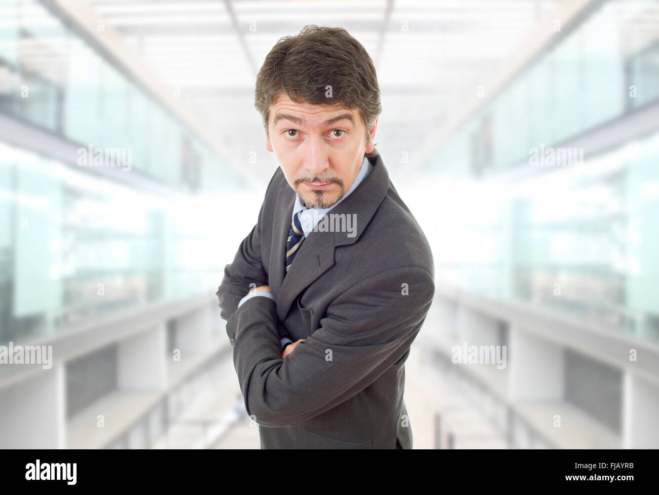 mad business man portrait at the office Stock Photo - Alamy