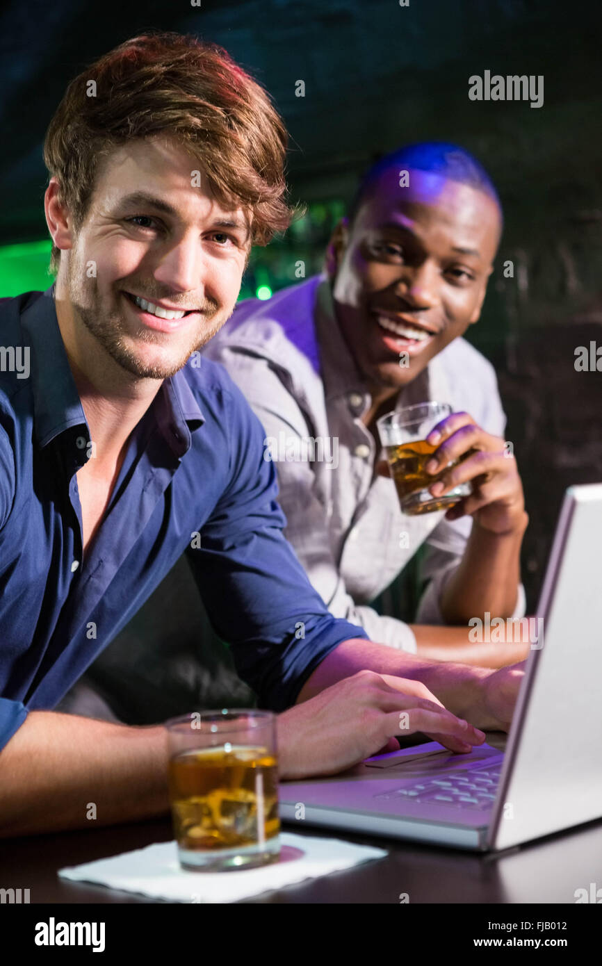 Two men with laptop computer hi-res stock photography and images - Alamy