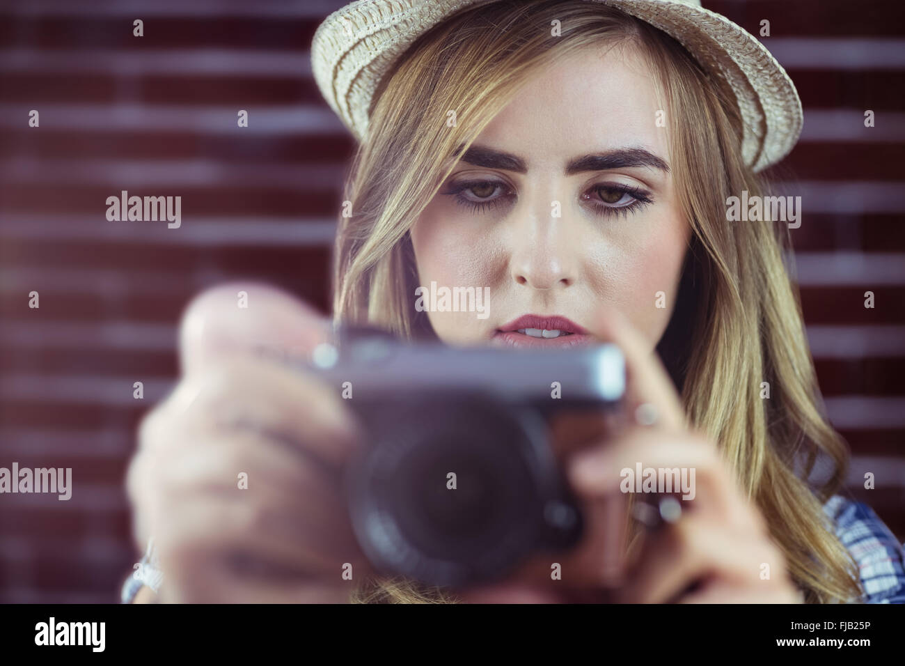Woman taking pictures Stock Photo - Alamy
