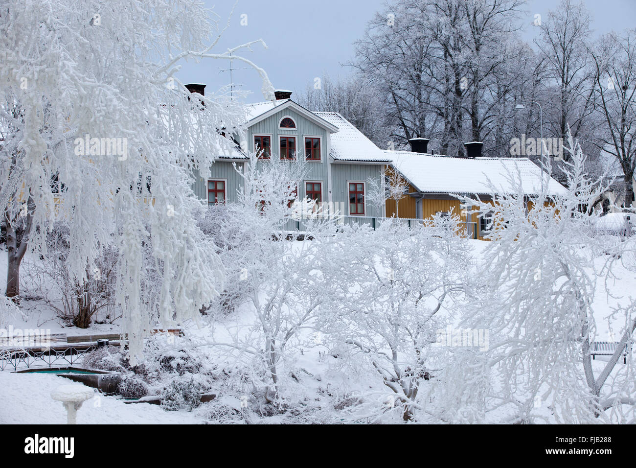 Winter Picture of a beautiful house in Sweden Stock Photo - Alamy