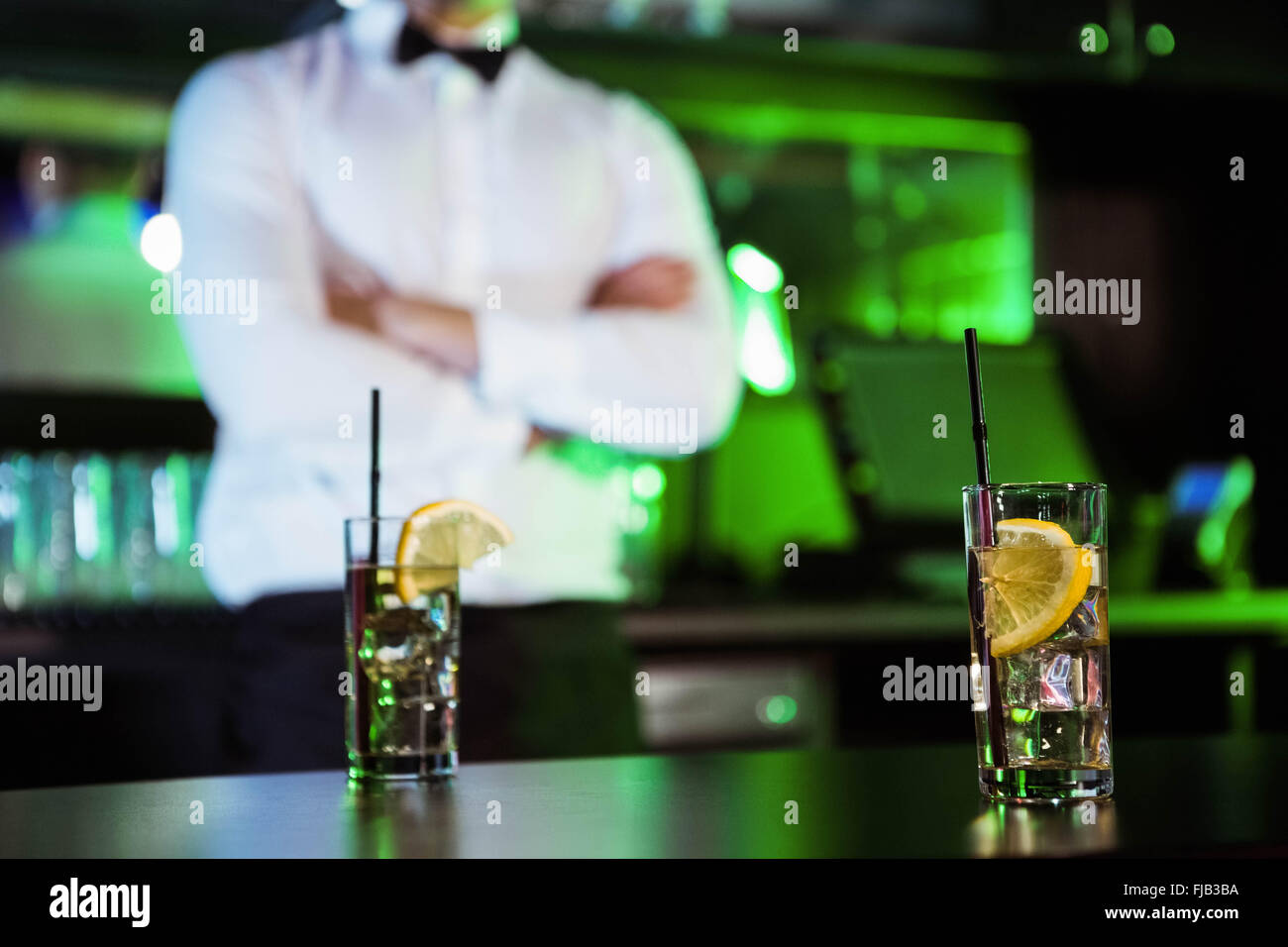 Two glasses of gin on bar counter Stock Photo - Alamy