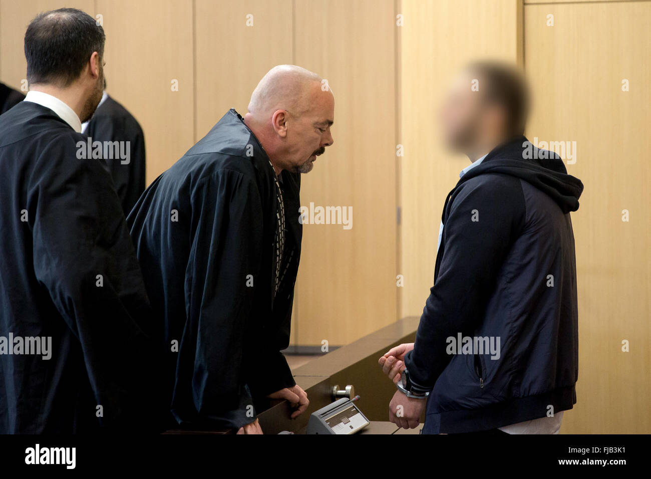 Duesseldorf, Germany. 1st Mar, 2016. Defendent Ugur S. (r) speaking ...