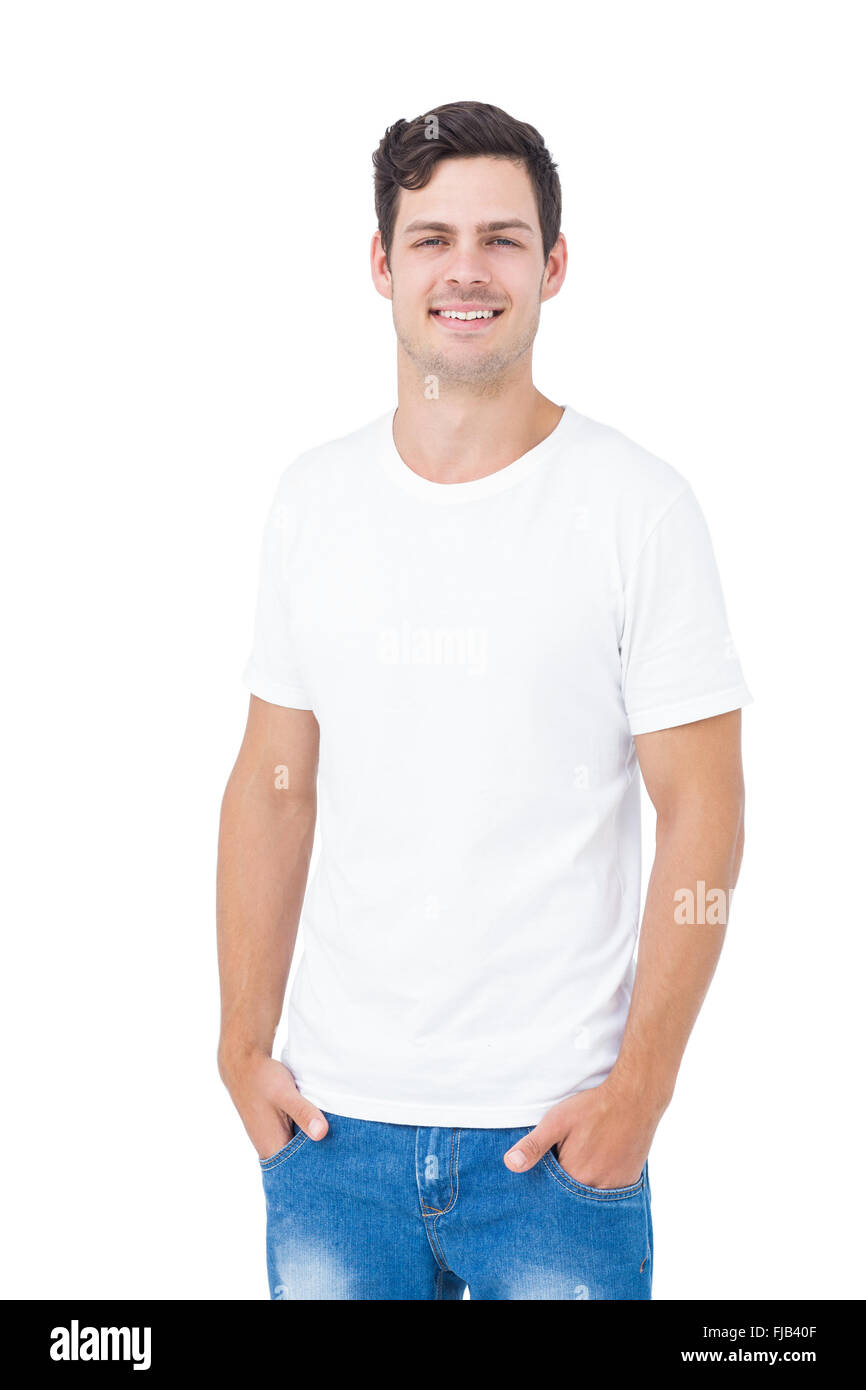 Handsome man posing with hands on pocket Stock Photo - Alamy