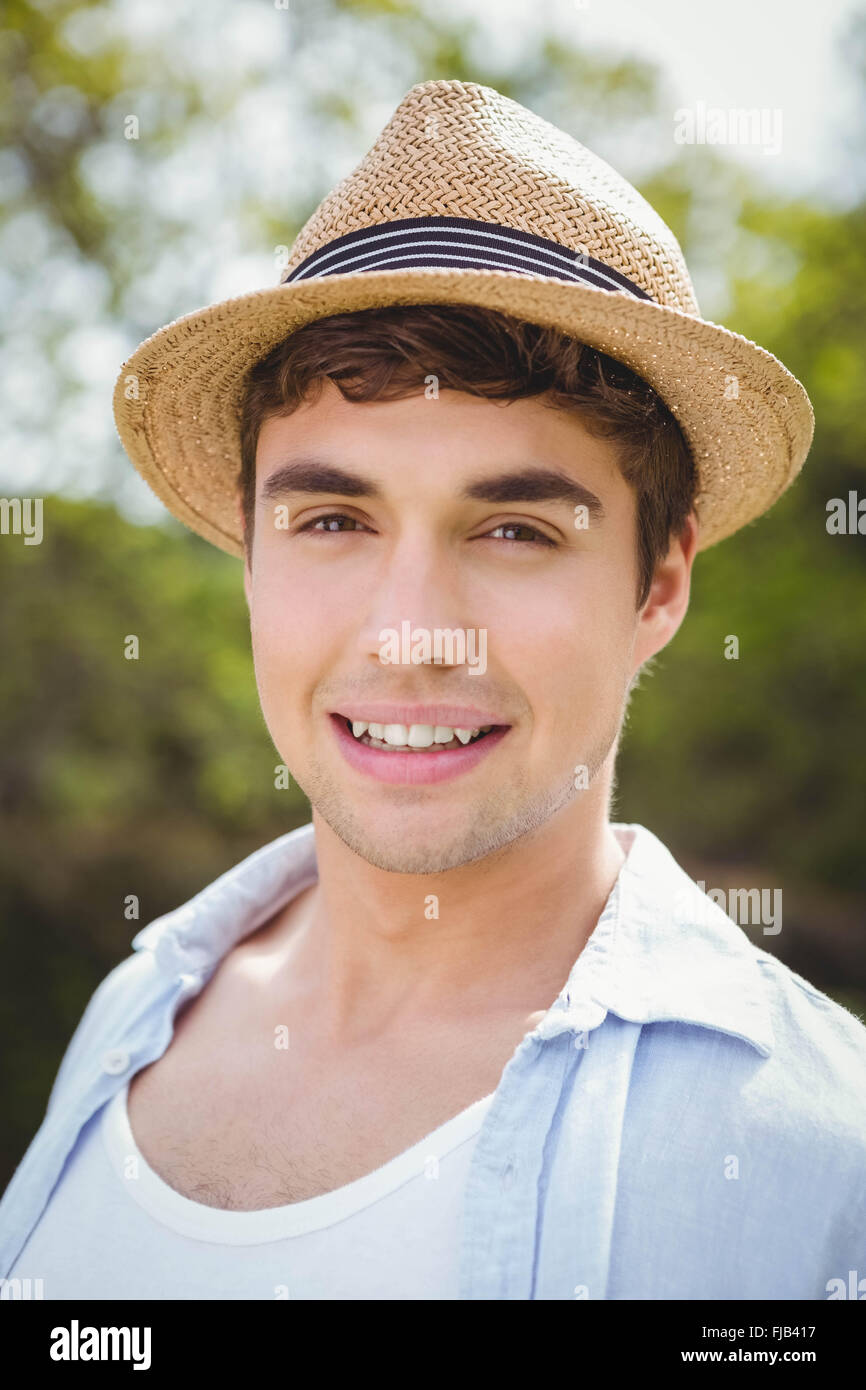 Close-up of young man standing in garden Stock Photo - Alamy