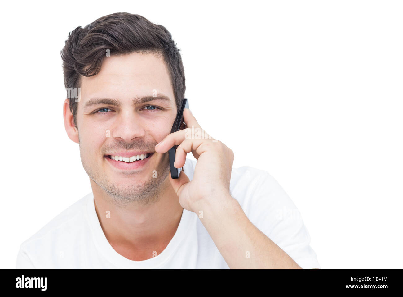 Handsome man having a phone call Stock Photo - Alamy