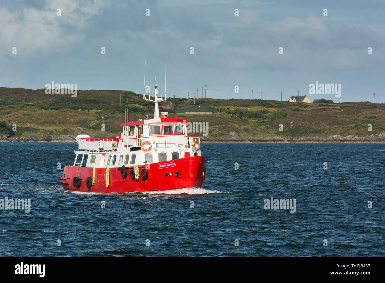 Sherkin Island ferry approaches Baltimore in west Cork in Ireland Stock ...