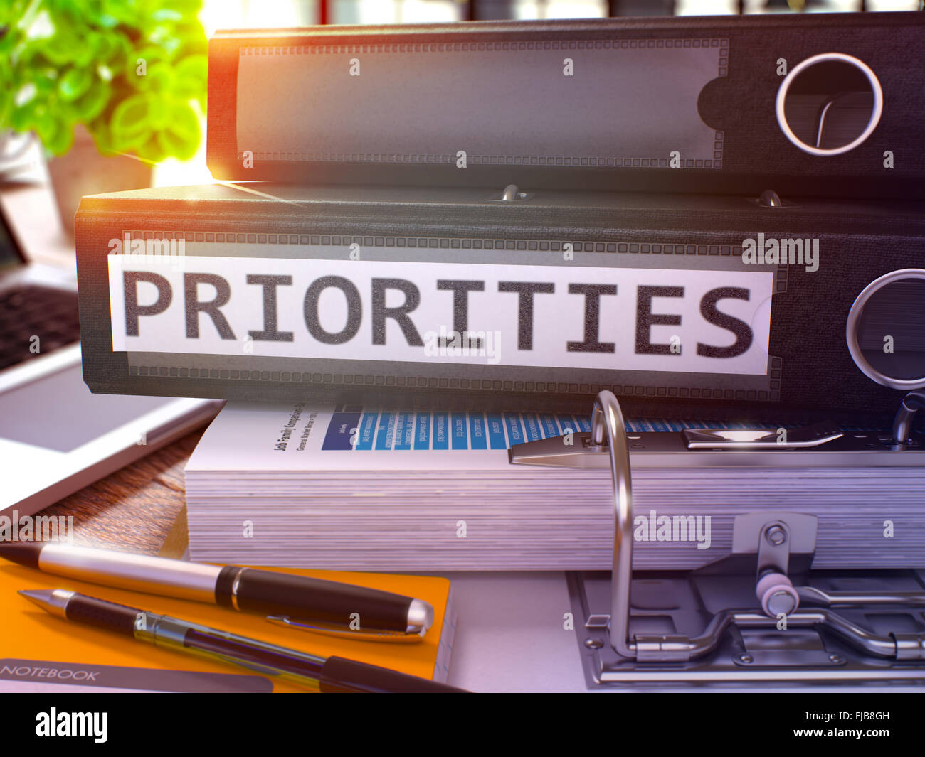 Priorities on Black Office Folder. Toned Image Stock Photo - Alamy