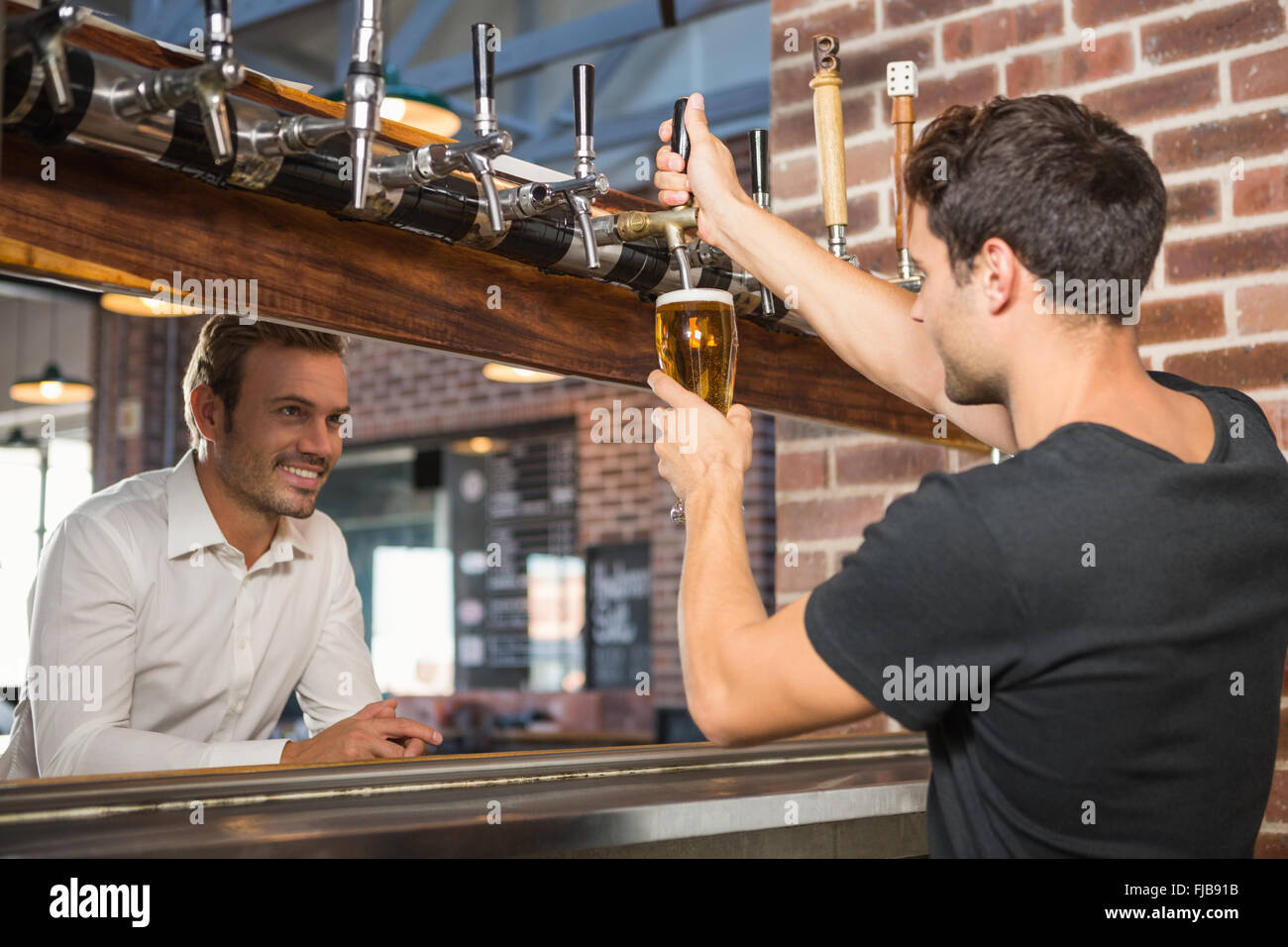 Bar staff pub customer hi-res stock photography and images - Alamy