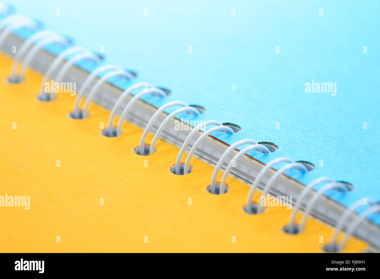 Closeup of open notebook with color pages. Nice background Stock Photo ...