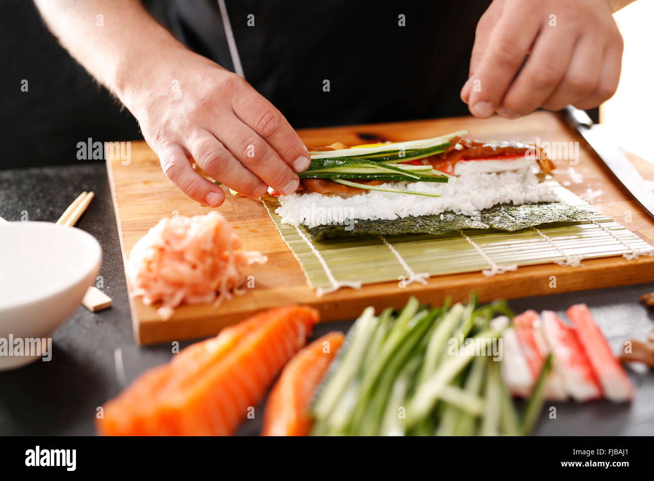 The steps for creating sushi. Folding sushi. Preparing sushi. Bamboo ...