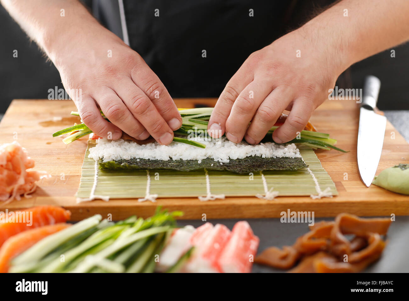 The steps for creating sushi. Folding sushi. Preparing sushi. Bamboo ...