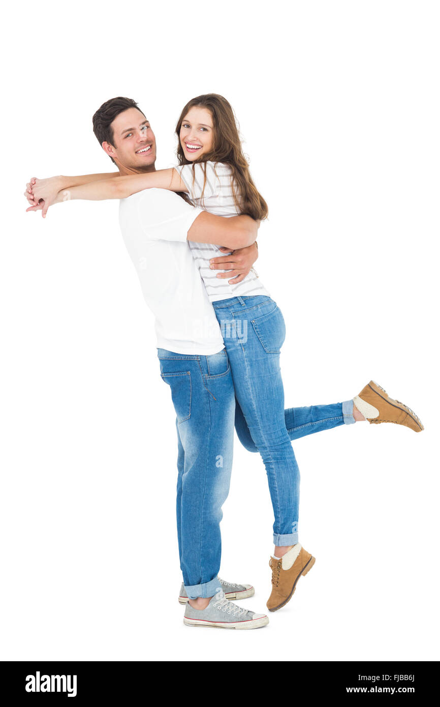 Smiling cute couple hugging Stock Photo - Alamy
