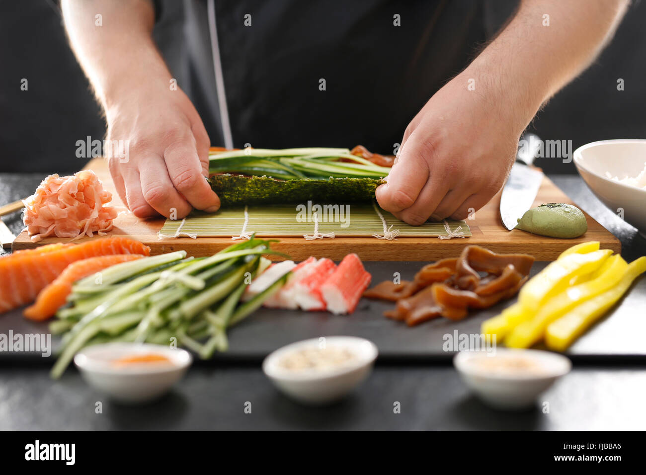 The steps for creating sushi. Folding sushi. Preparing sushi. Bamboo ...