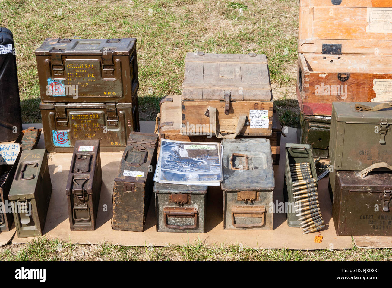 Two rows of various types of ammunition boxes from the Second world war ...