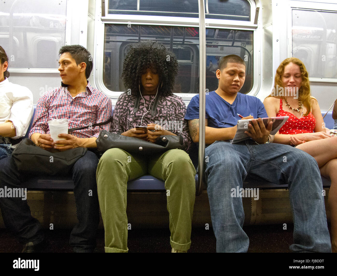 subway riders on train NYC Stock Photo - Alamy