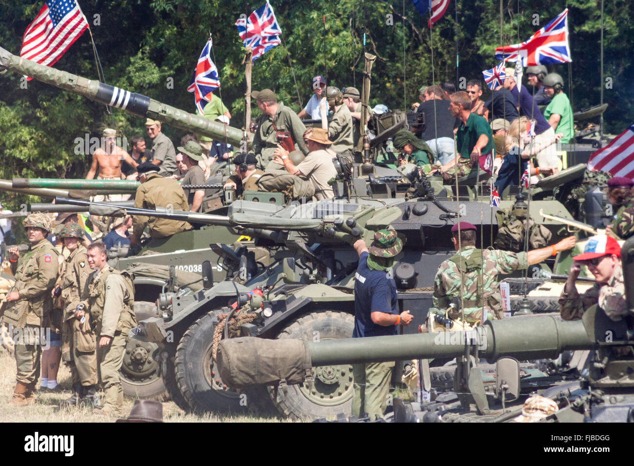 War and Peace show, England. Telephoto shot, view across line of tanks ...