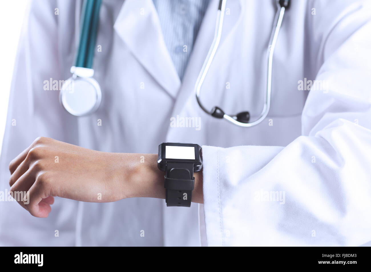 Asian doctor showing her smart watch Stock Photo - Alamy