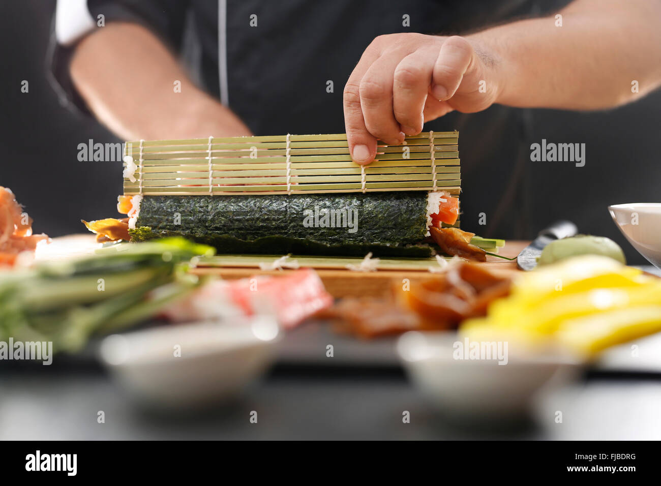 The steps for creating sushi. Folding sushi. Preparing sushi. Bamboo ...