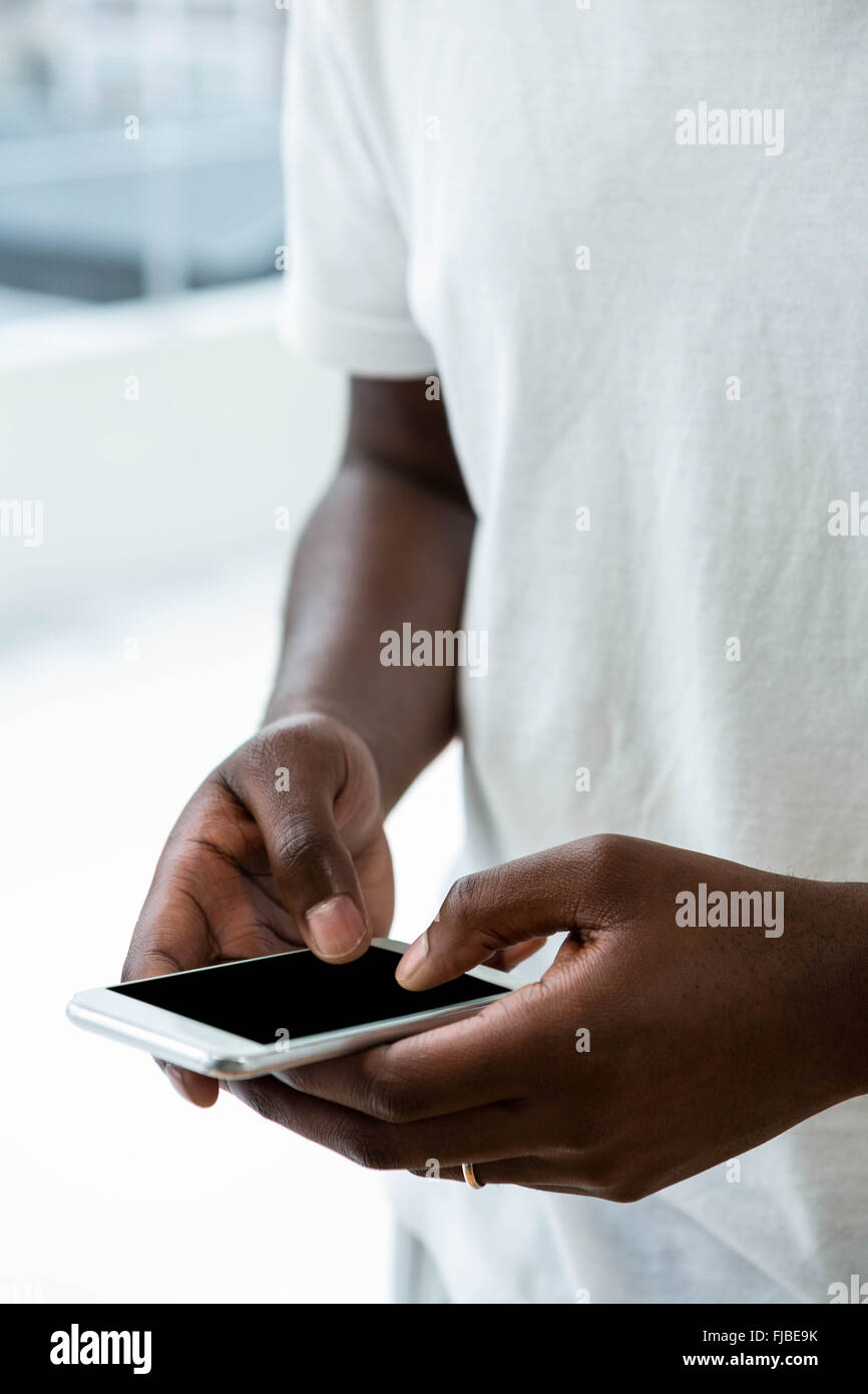 Man text messaging on mobile phone Stock Photo - Alamy