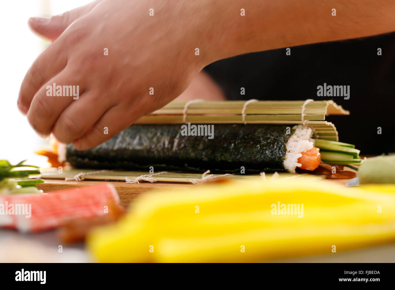 The steps for creating sushi. Folding sushi. Preparing sushi. Bamboo ...