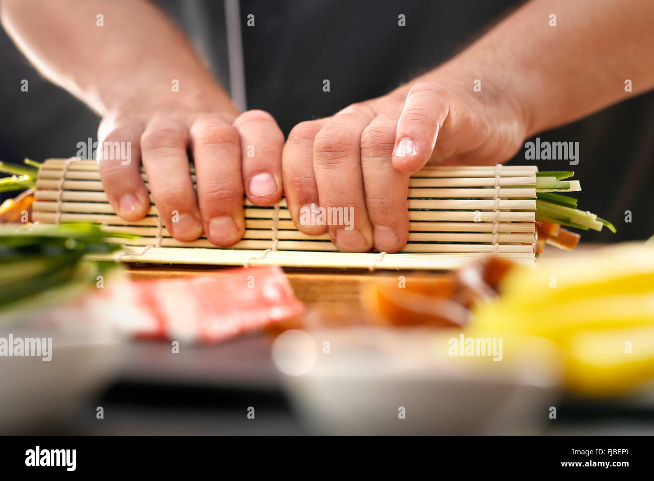 The steps for creating sushi. Folding sushi. Preparing sushi. Bamboo ...