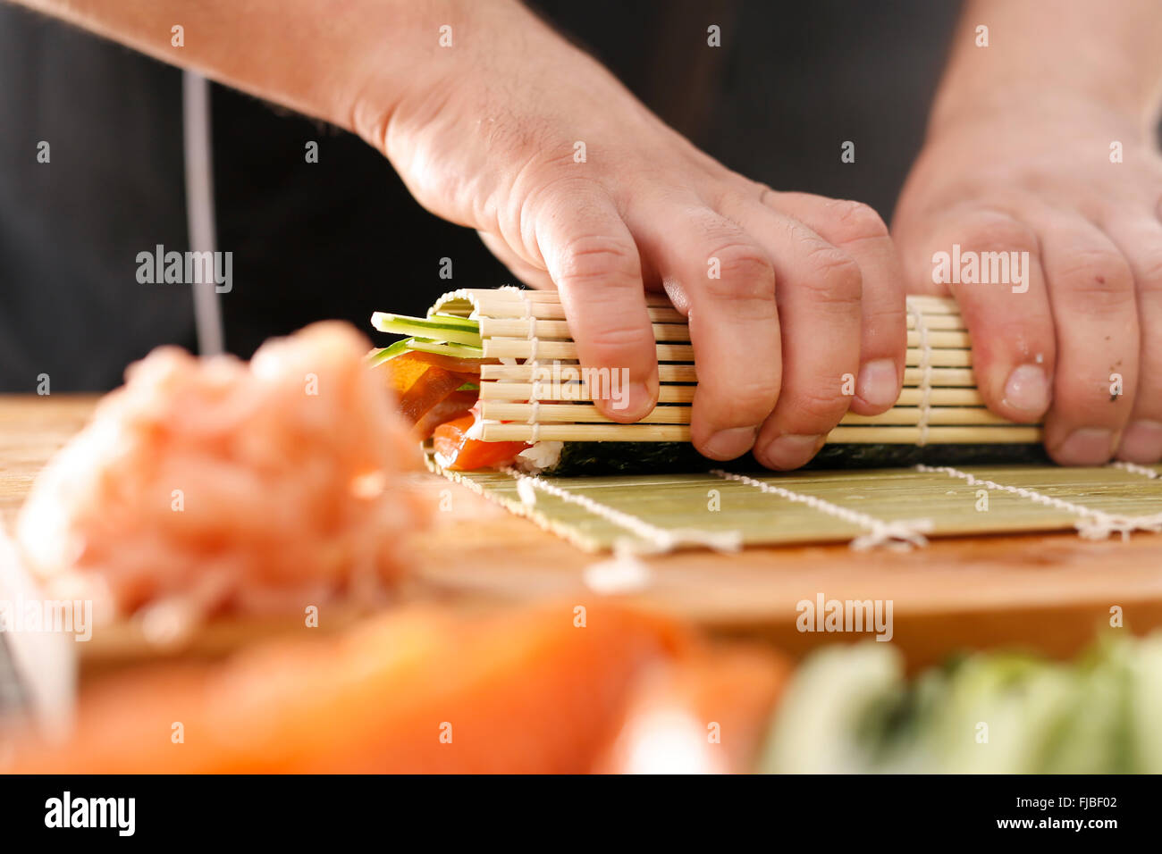 The steps for creating sushi. Folding sushi. Preparing sushi. Bamboo ...