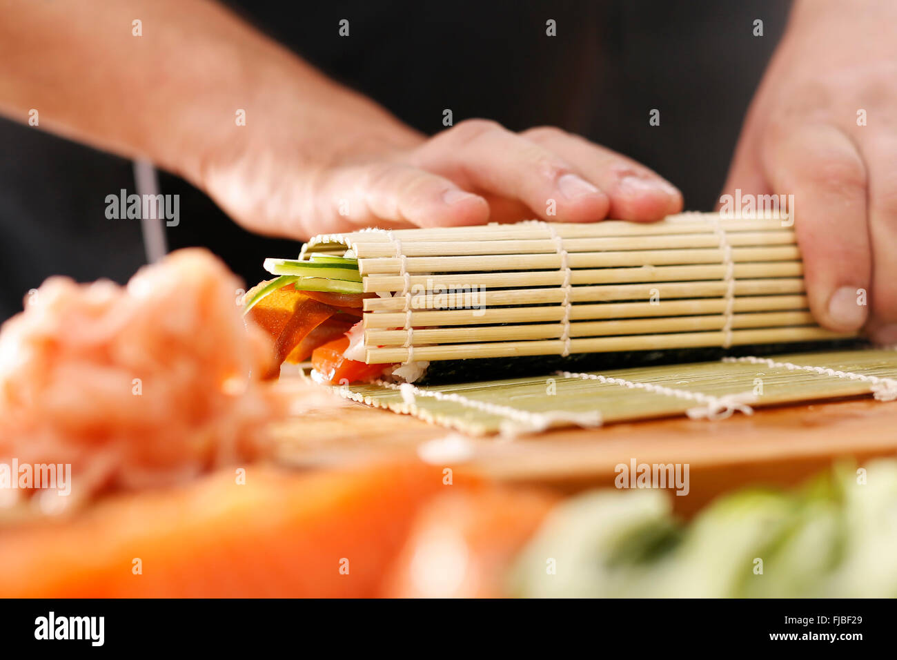 The steps for creating sushi. Folding sushi. Preparing sushi. Bamboo ...