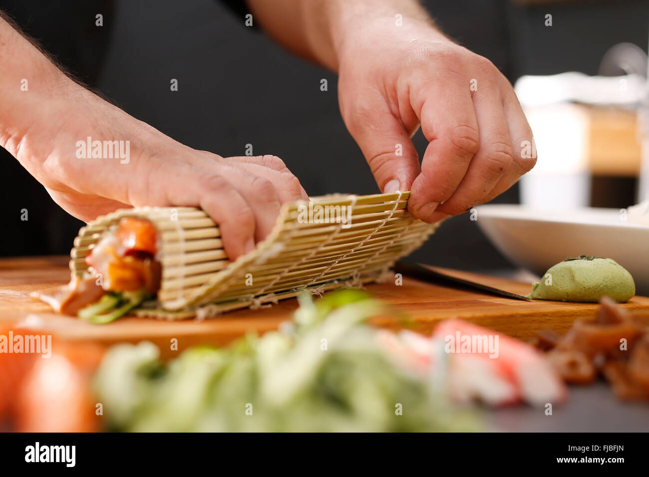 The steps for creating sushi. Folding sushi. Preparing sushi. Bamboo ...