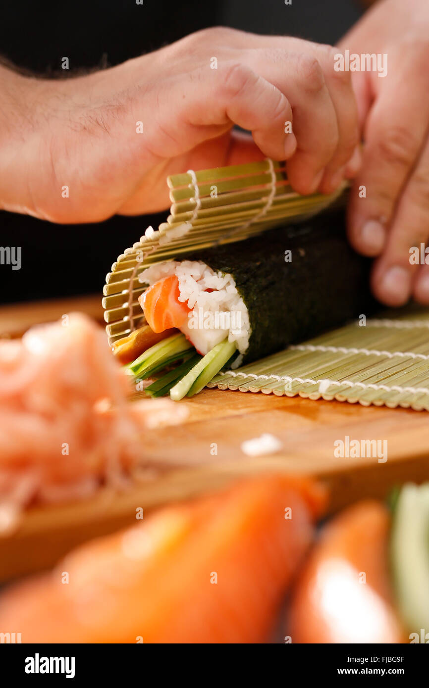 The steps for creating sushi. Folding sushi. Preparing sushi. Bamboo ...
