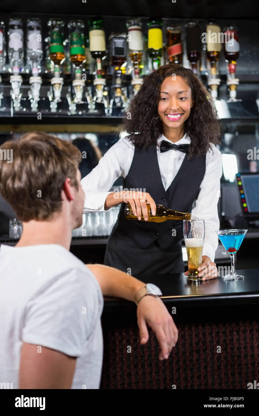 Beautiful barmaid pouring beer in hi-res stock photography and images ...