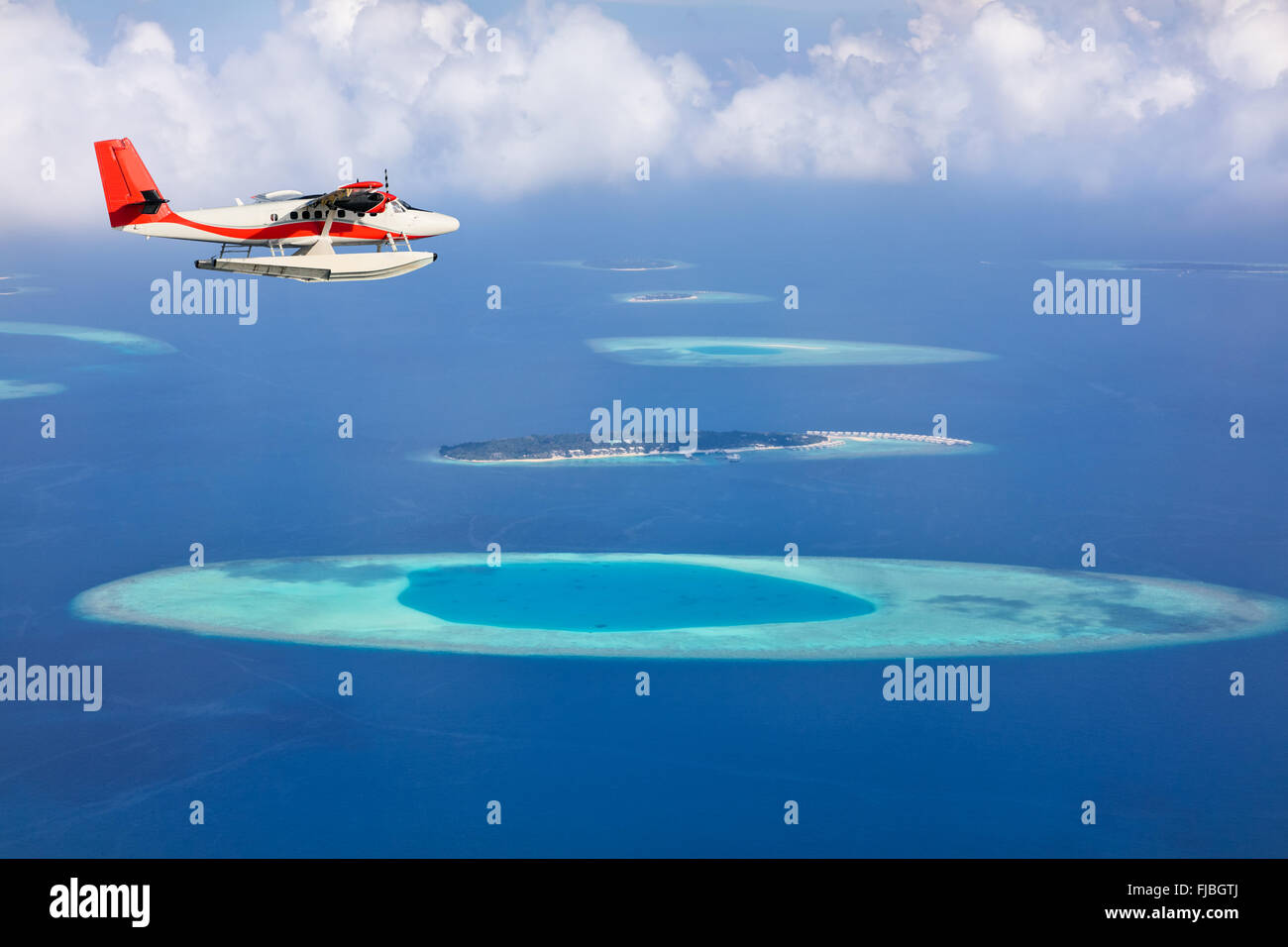 Maldives seaplane flying above islands Stock Photo - Alamy