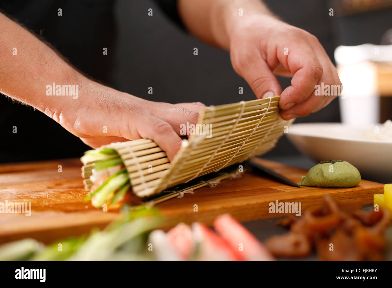 The steps for creating sushi. Folding sushi. Preparing sushi. Bamboo ...