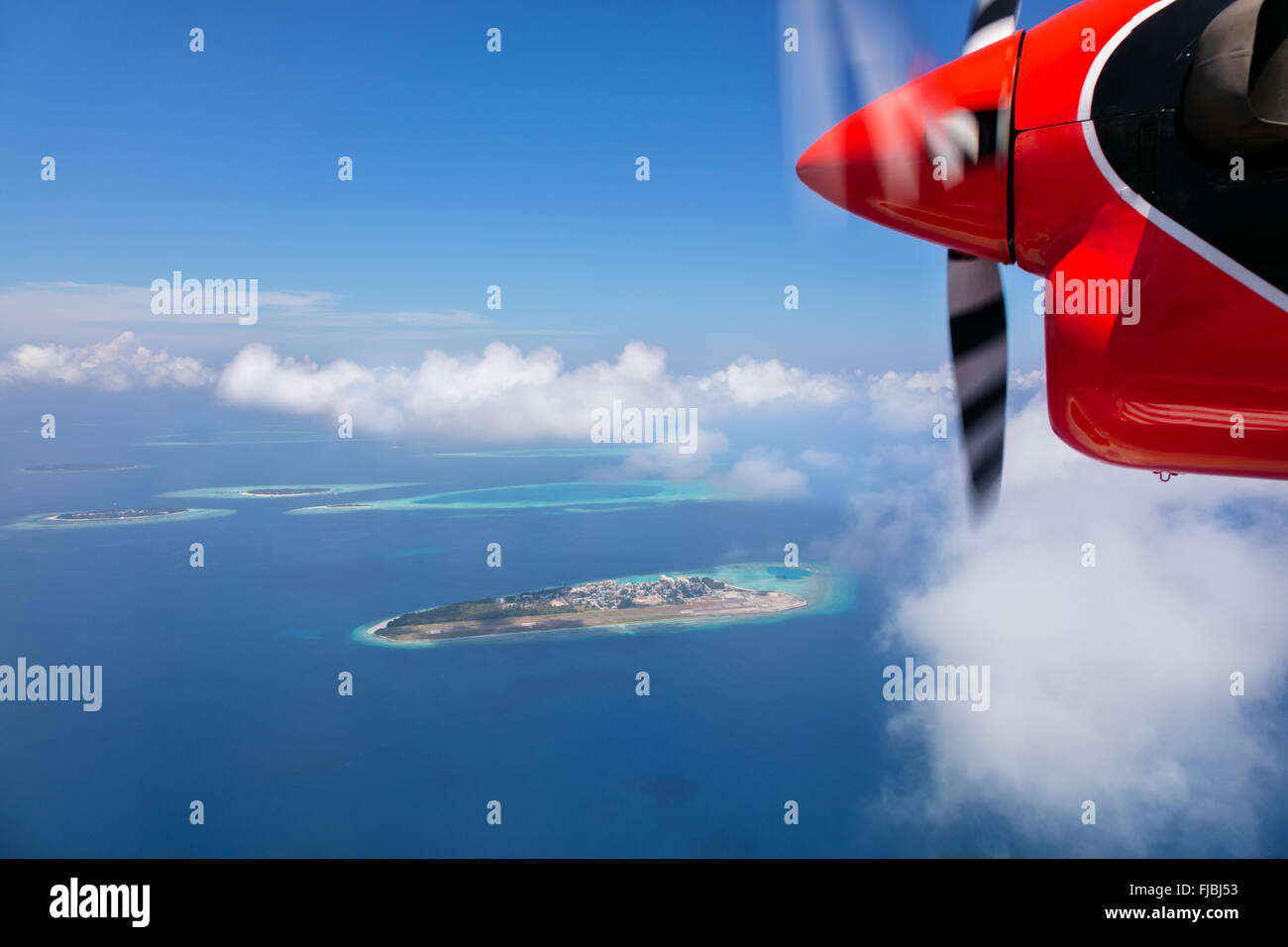 Maldives seaplane flying above islands Stock Photo - Alamy