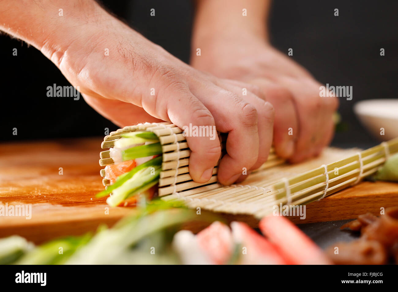 The steps for creating sushi. Folding sushi. Preparing sushi. Bamboo ...