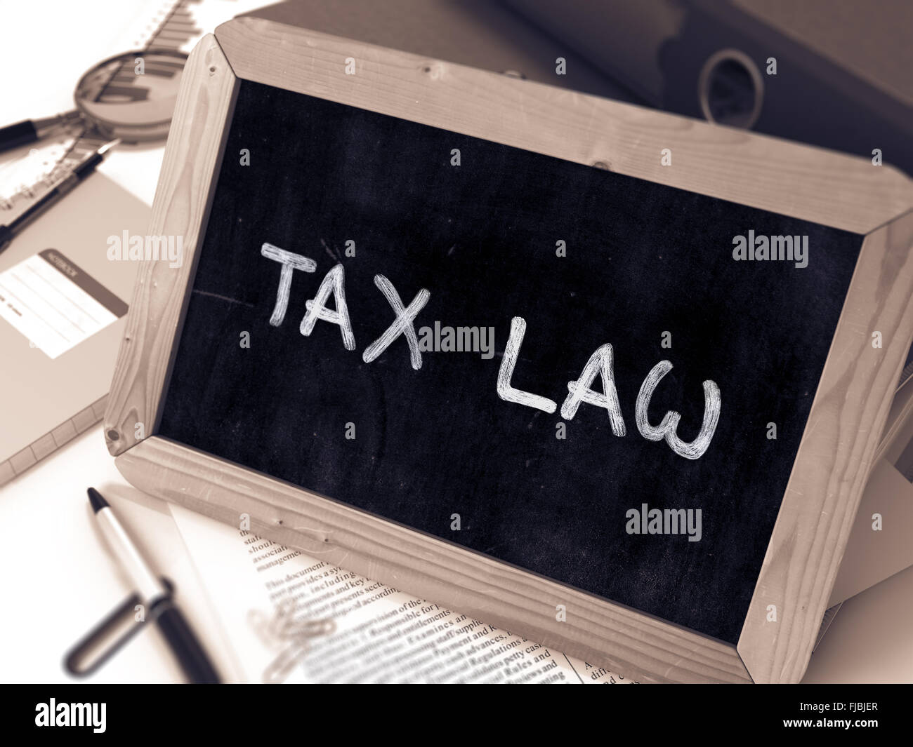 Tax Law Concept Hand Drawn on Chalkboard Stock Photo - Alamy